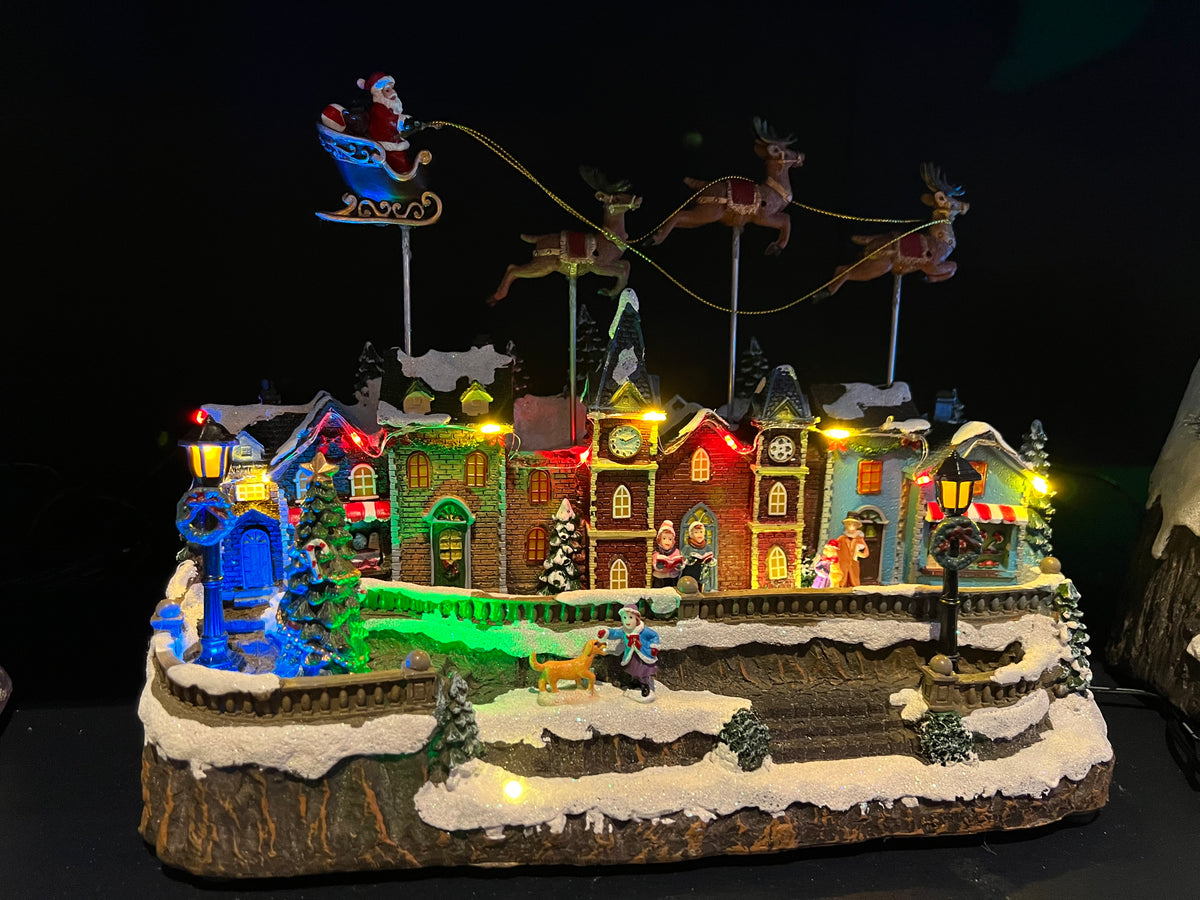 LED Christmas Village House Scene with Animated Santa and his Sleigh D ...